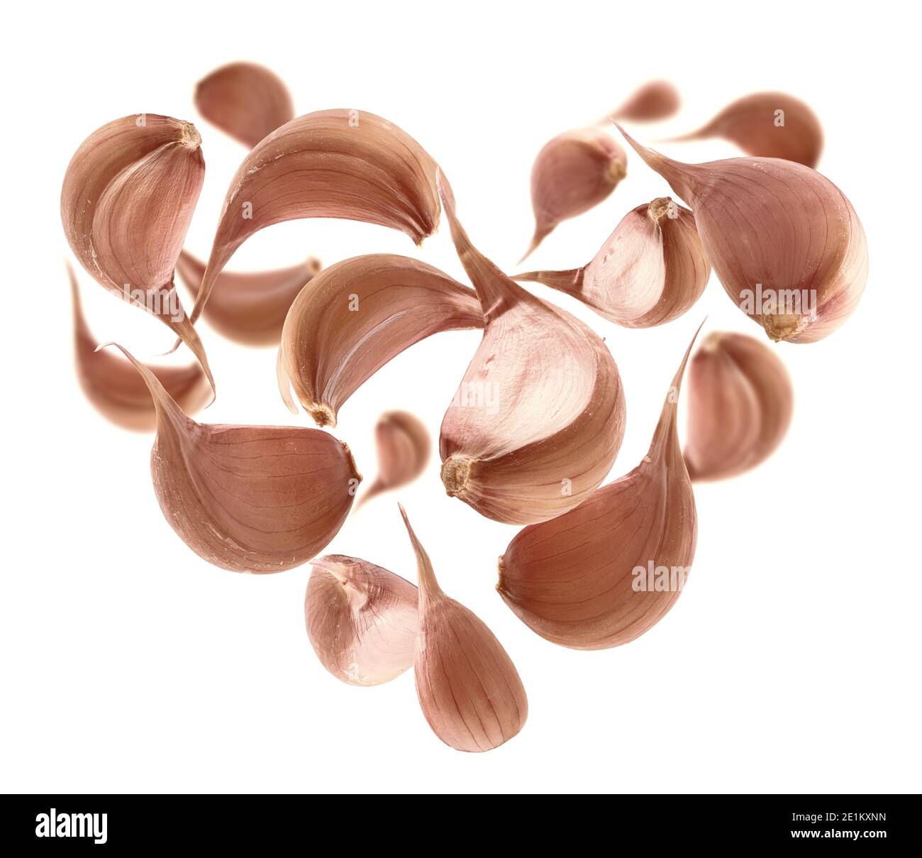 Ripe garlic in the shape of a heart on a white background Stock Photo ...