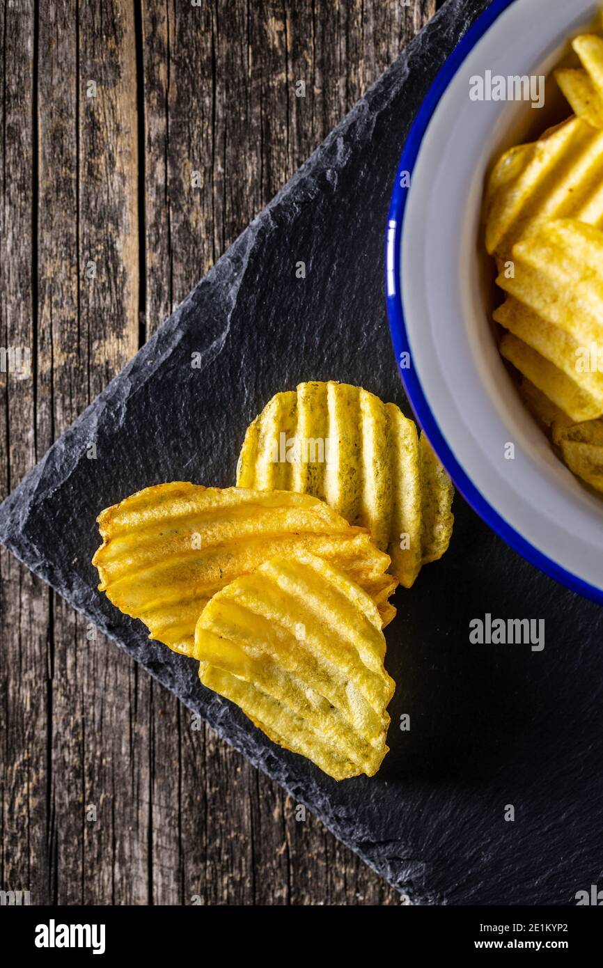 Crispy potato chips. Top view Stock Photo - Alamy