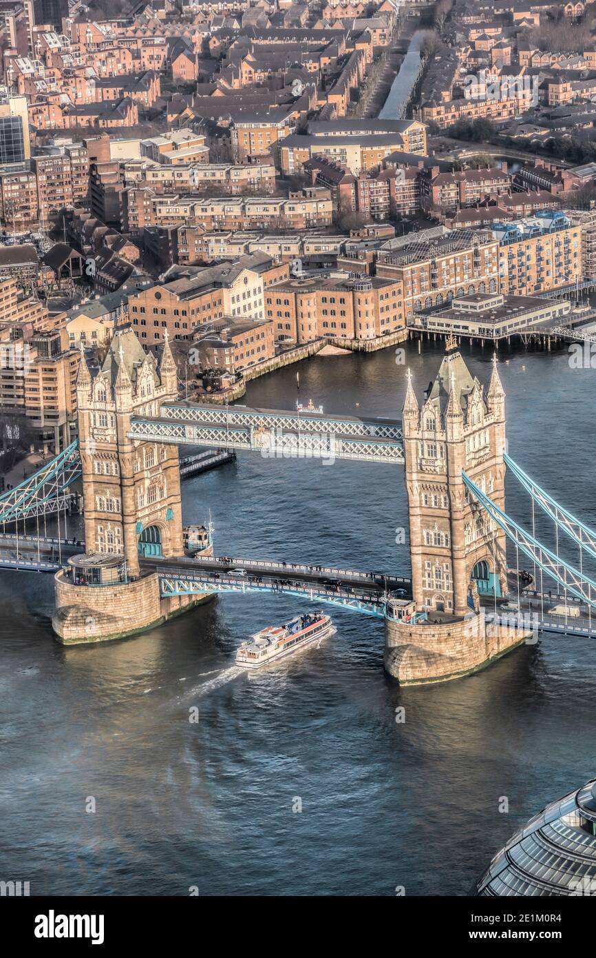 Tower Bridge with boat on the river in London, England, UK Stock Photo ...