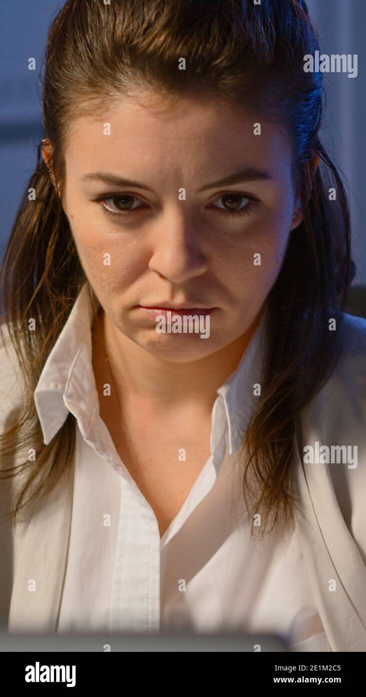Portrait exhausted workaholic manager checking hi-res stock photography ...