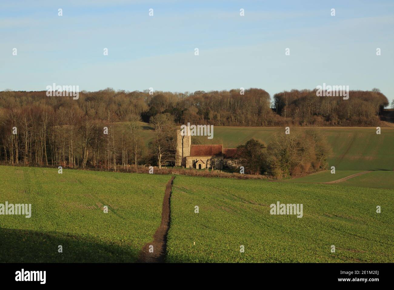 Winter view across fields to Saint Cosmos and Saint Damian church ...