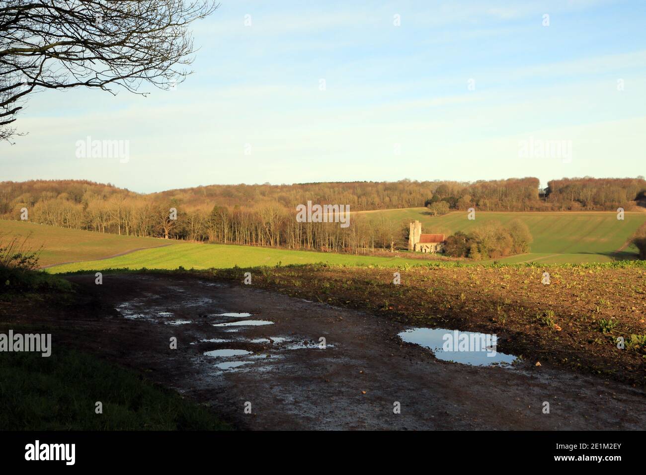 Winter view across fields to Saint Cosmos and Saint Damian church ...