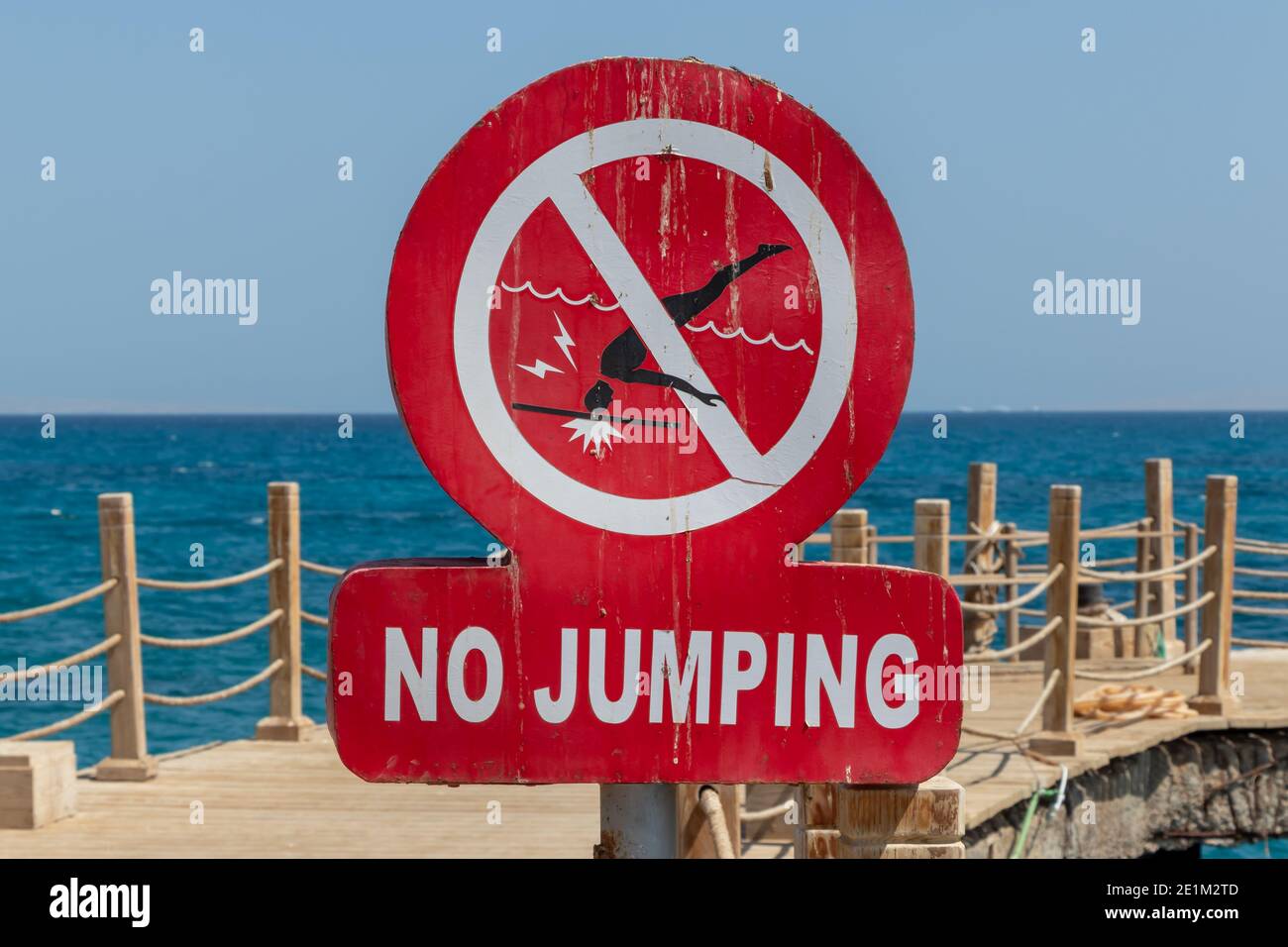 Sign warning of no Jumping on the pier in Hurghada, Egypt Stock Photo ...
