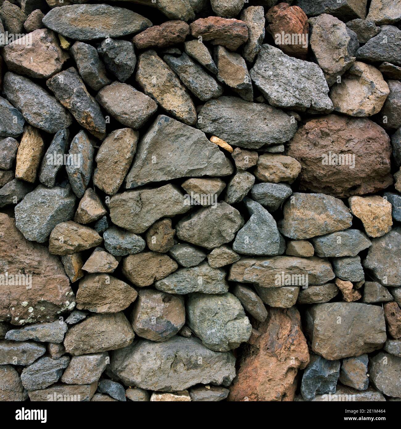 Stone wall built from various rocks in a rural setting showcasing ...