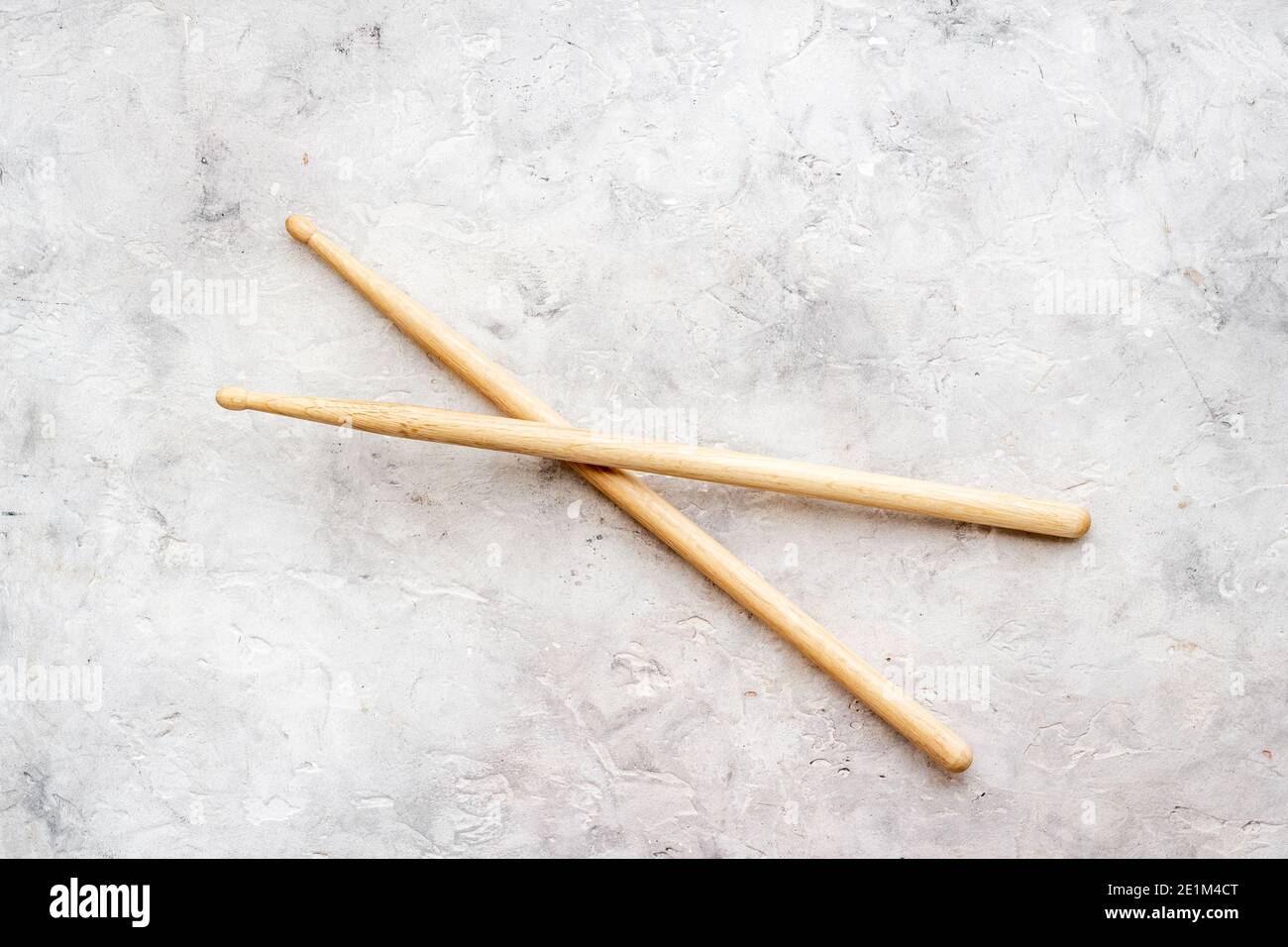 Two drum sticks, top view. Music background Stock Photo - Alamy