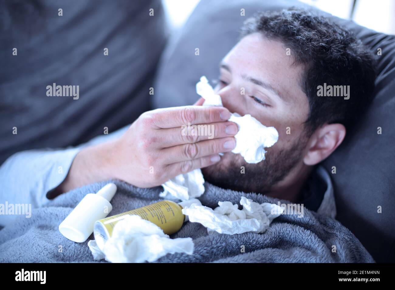 sick man , flu or Covid-19, cold and he has fever Stock Photo - Alamy