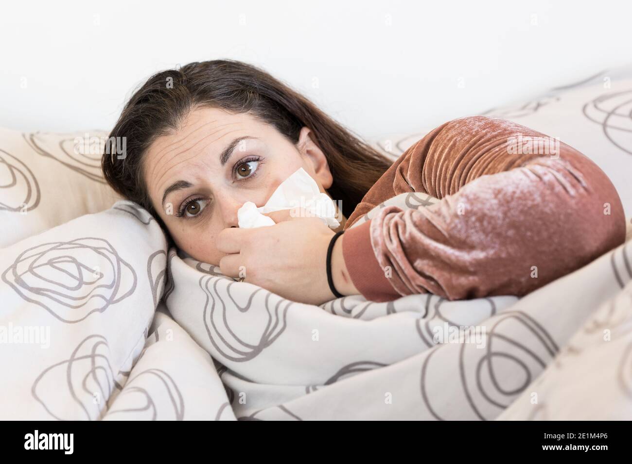 sick woman , flu or covid19 desease, cold and she has fever Stock Photo ...