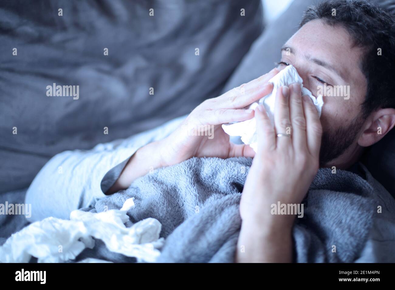sick man , flu or Covid-19, cold and he has fever Stock Photo - Alamy