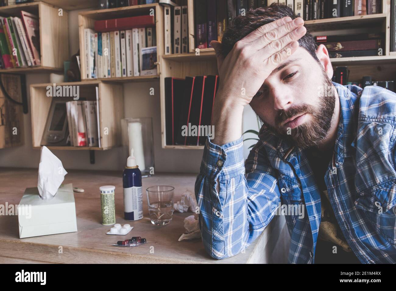 sick man , flu or Covid-19, cold and he has fever Stock Photo - Alamy