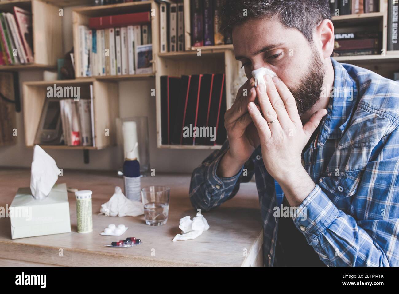 sick man , flu or Covid-19, cold and he has fever Stock Photo - Alamy