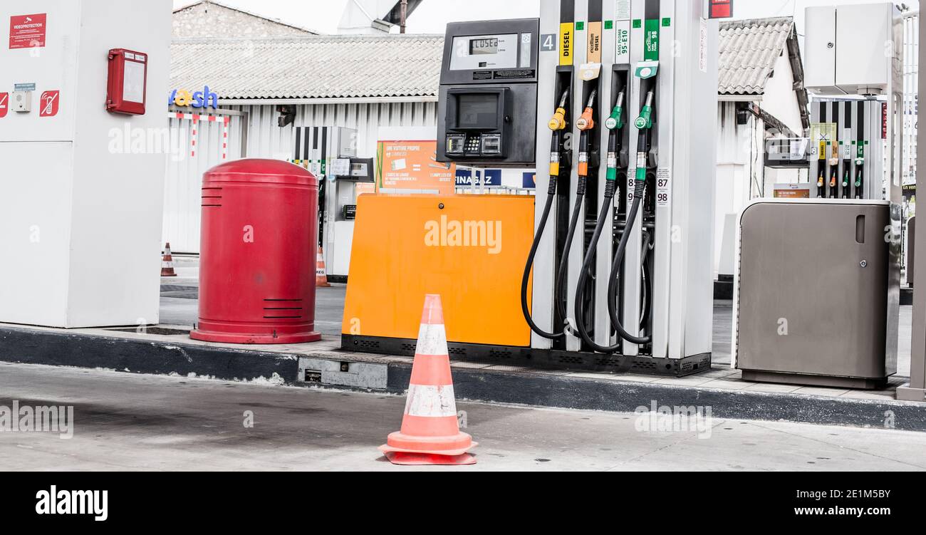 Colorfull fuel gasoline dispenser background. Fuel pumps station close ...