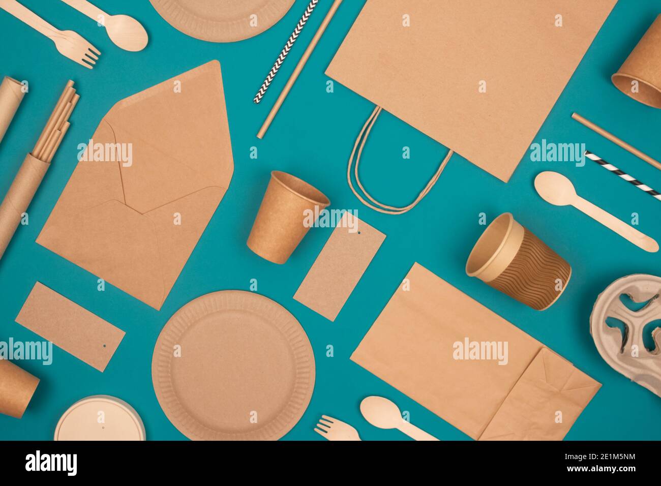 Flat lay with eco-friendly tableware - kraft paper food packaging on ...