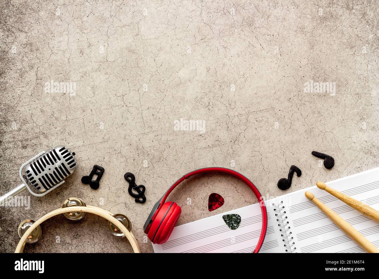 Flat lay of music background - instrument with sheet music, top view ...