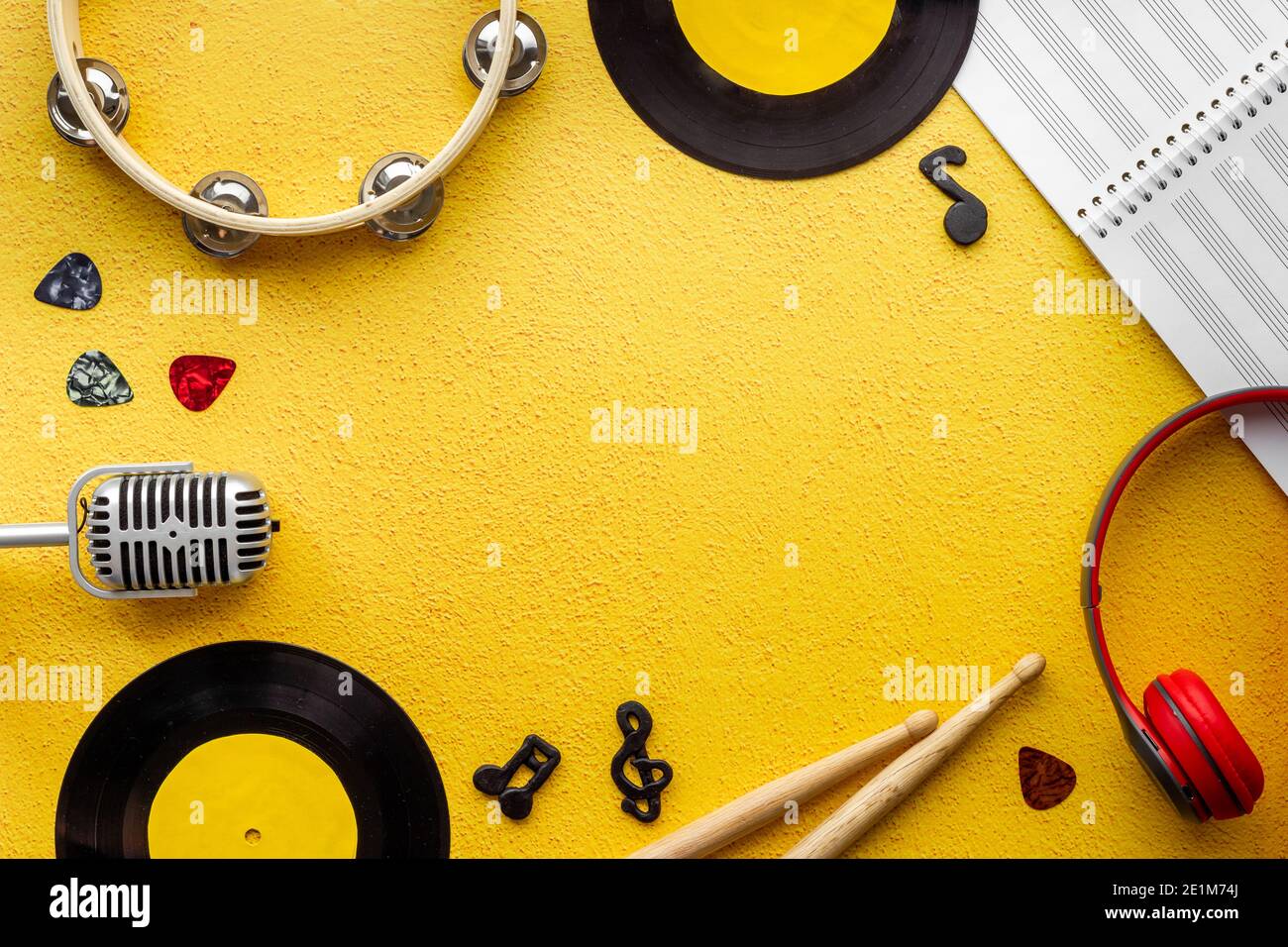 Flat lay of music background - instrument with sheet music, top view ...