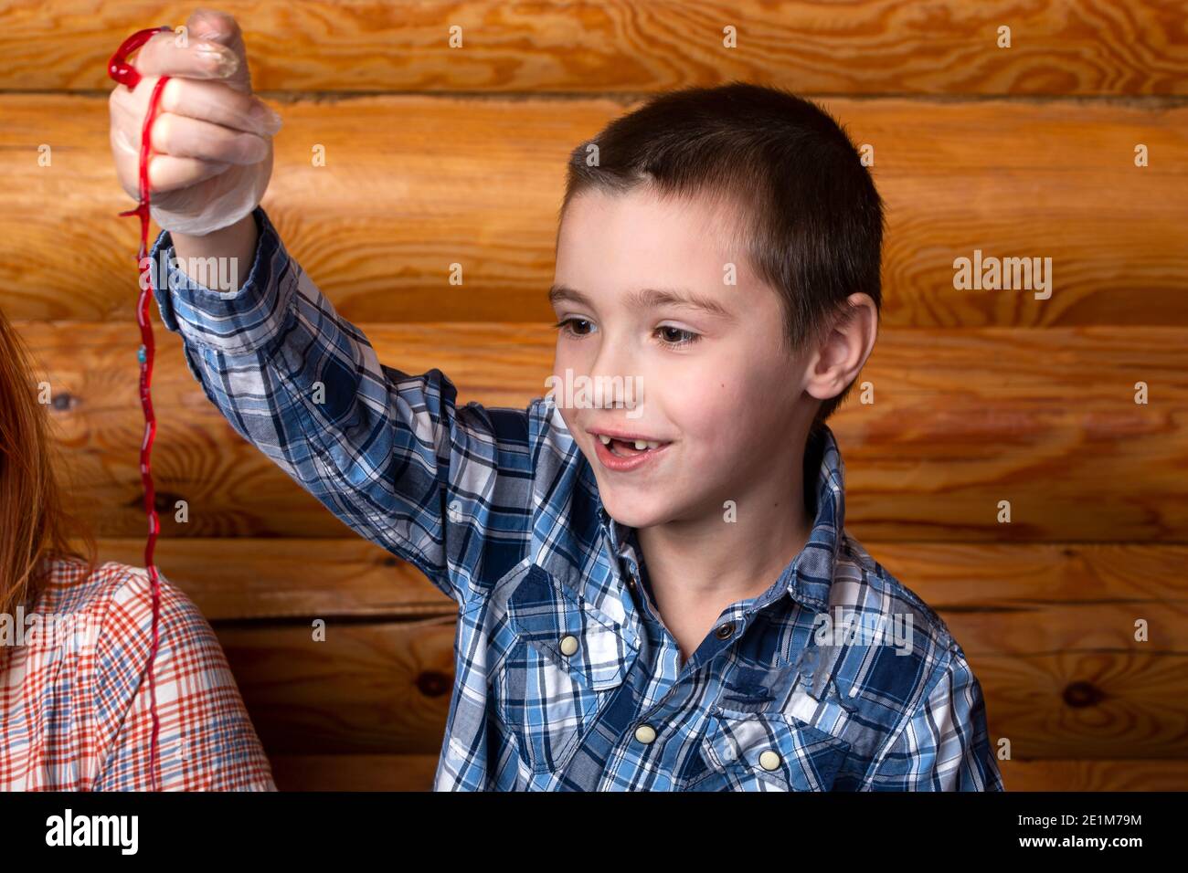Chemistry education and study concept. close-up boy smile and hold a ...