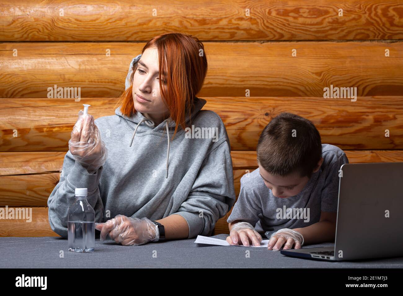 Chemistry education and study concept. Little boy reads instructions ...