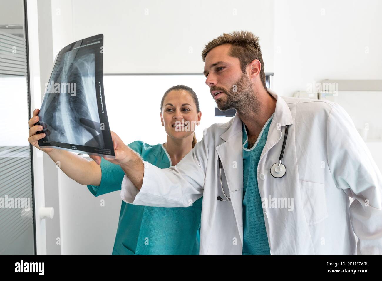 doctor examining an x-ray at hospital Stock Photo - Alamy