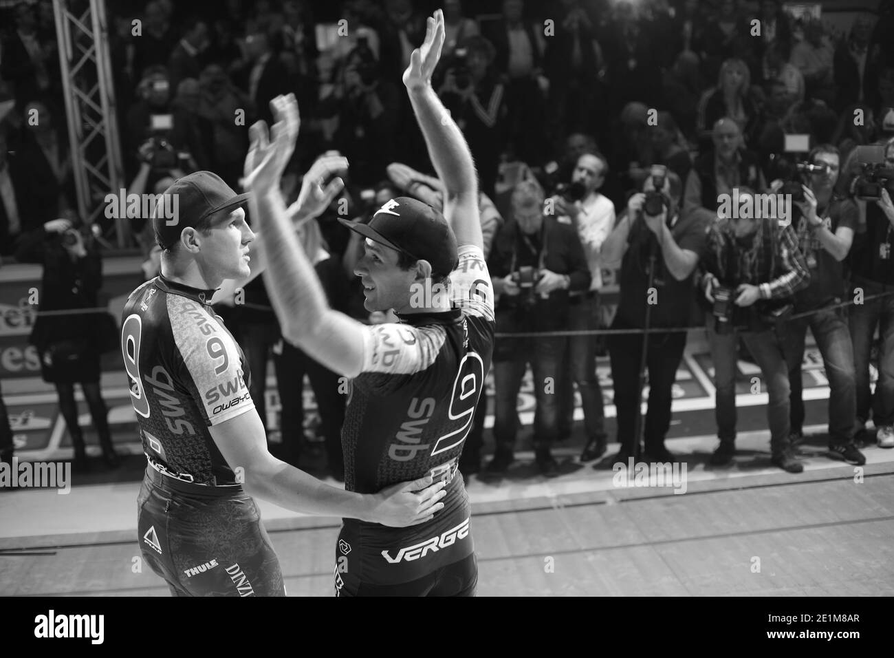 Winner celebrating on the podium at Six Days of Bremen track cyling ...