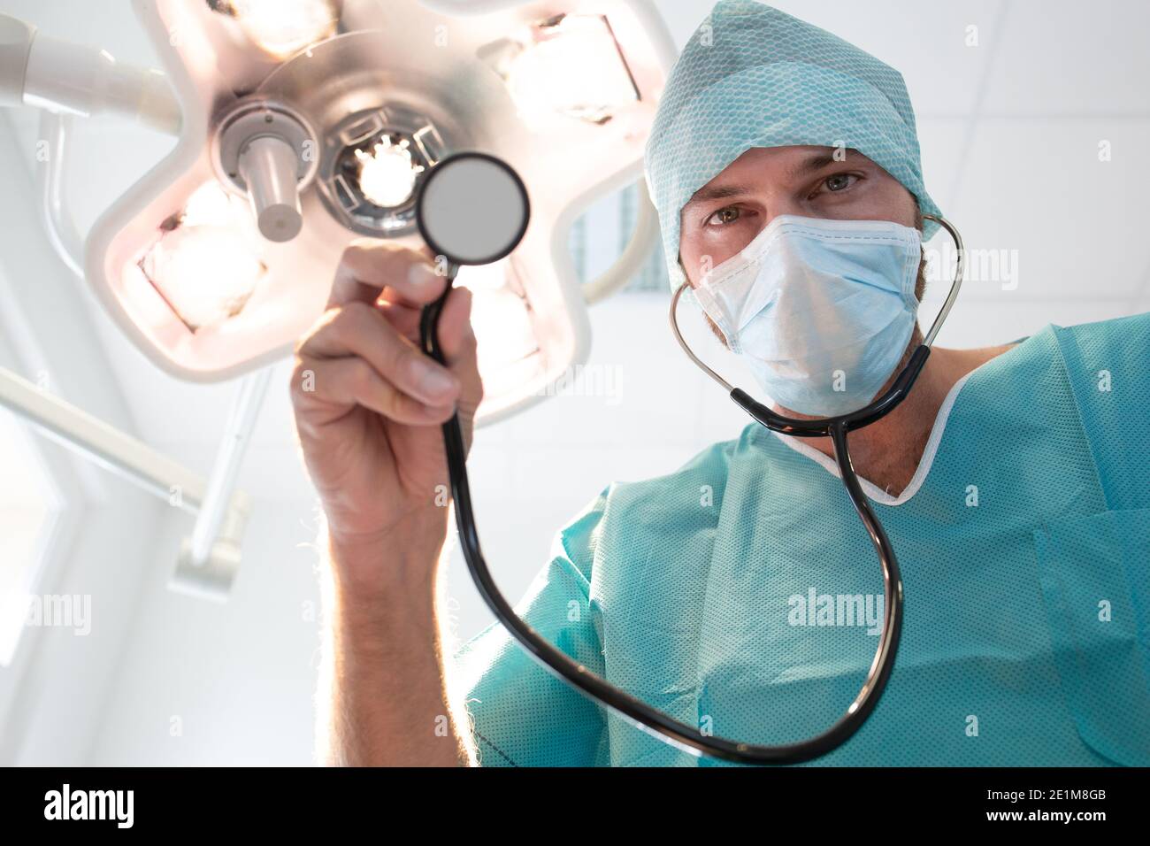 Nurse or surgeon with sthetoscope look at us in hospital Stock Photo ...