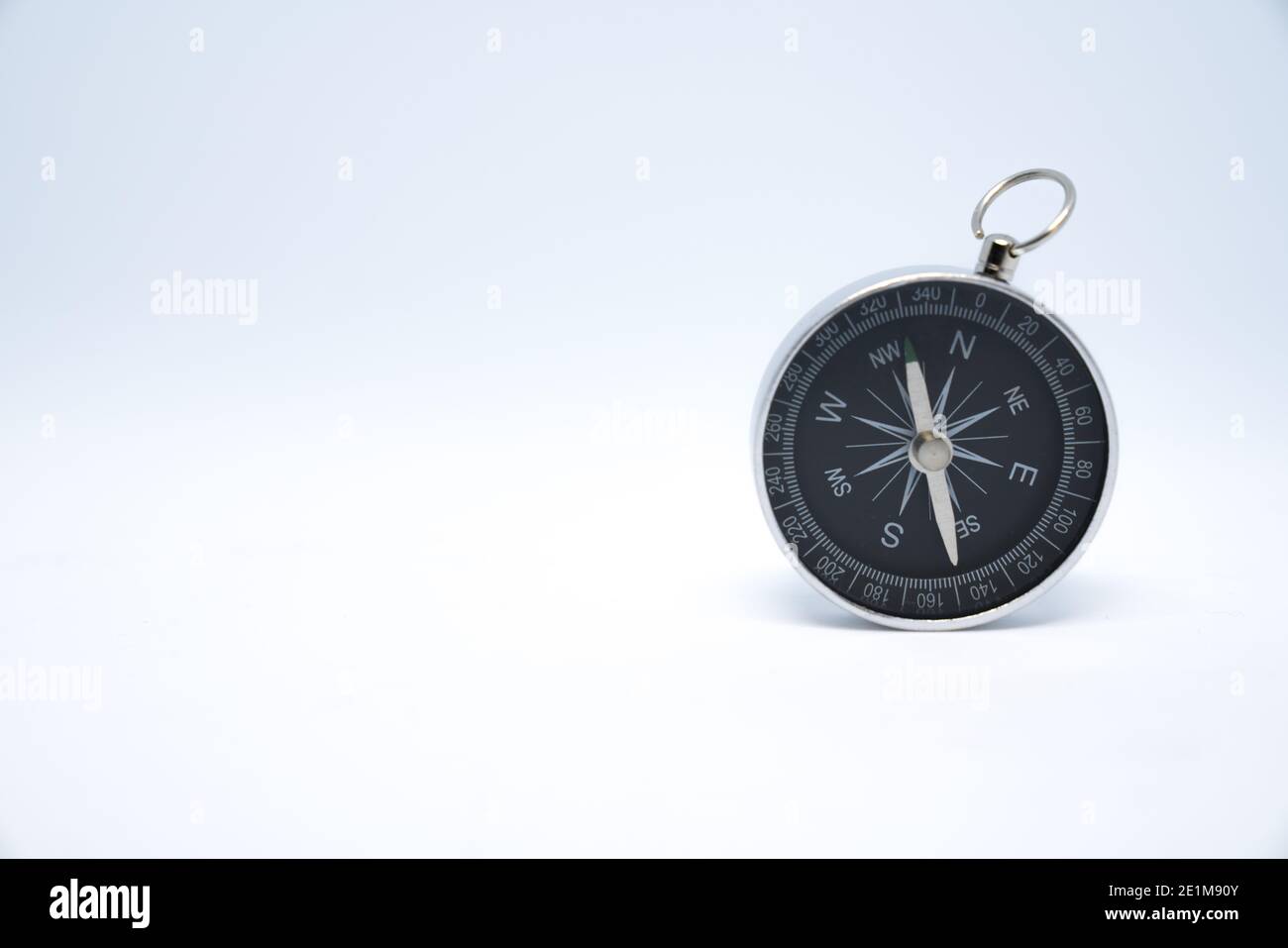 Compass isolated on white background with copy space Stock Photo - Alamy