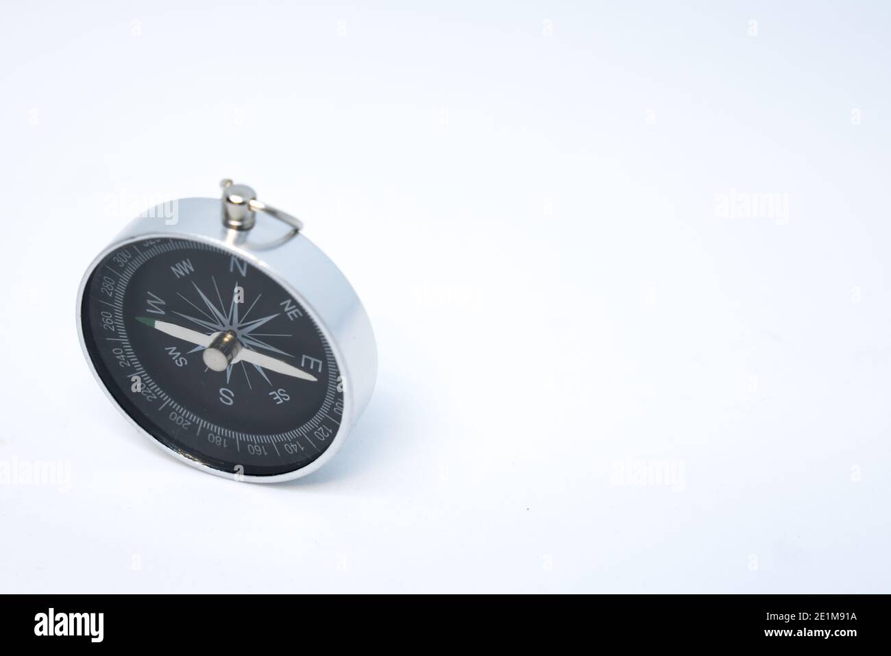 Compass isolated on white background with copy space Stock Photo - Alamy