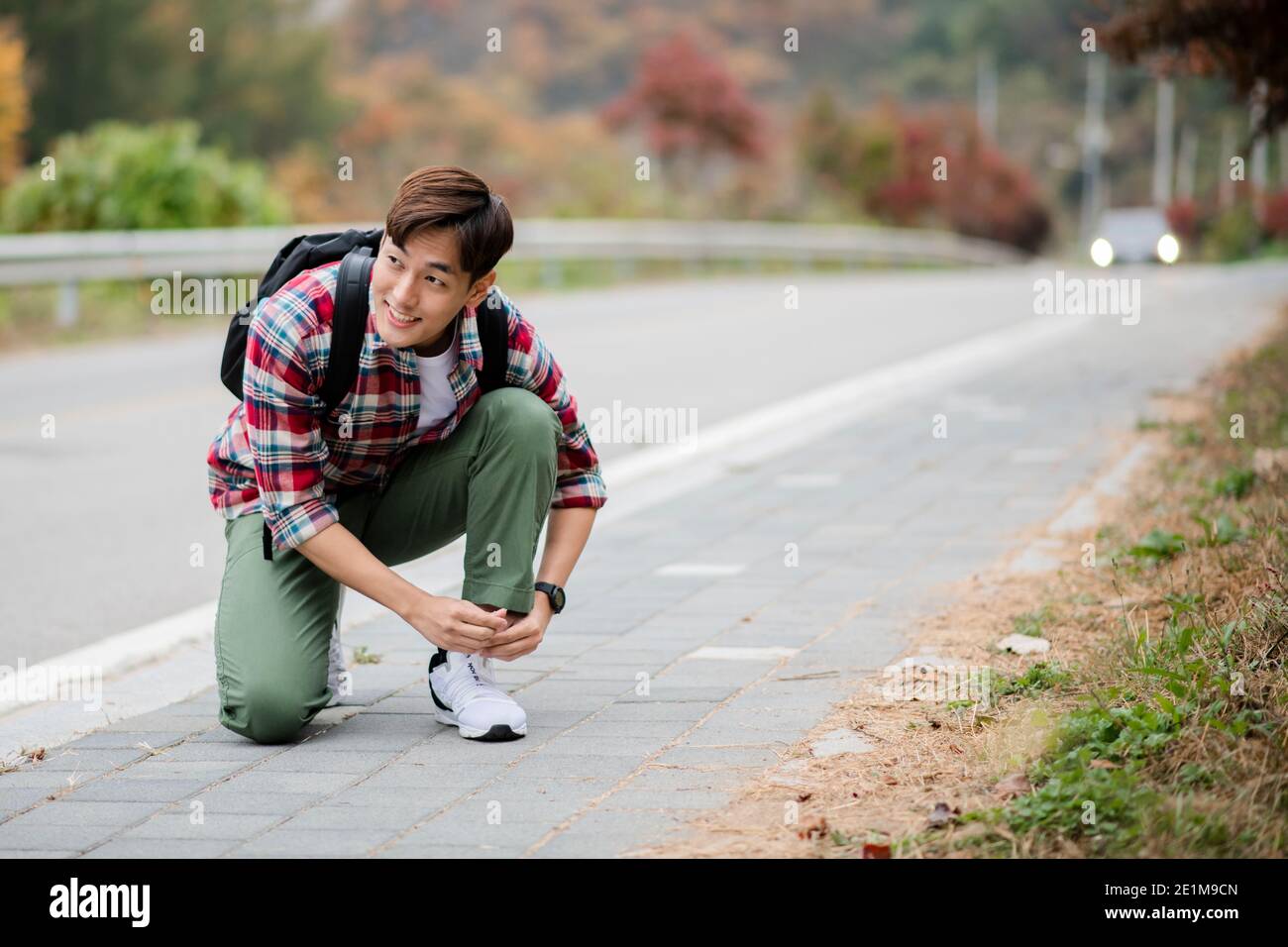 handsome Asian male model autumn travel concept Stock Photo - Alamy