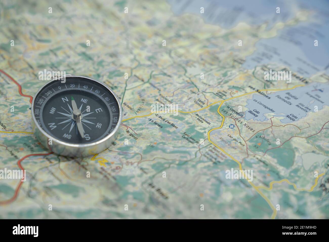 traveling concept with a map, compass, and airplane, symbol of travel ...