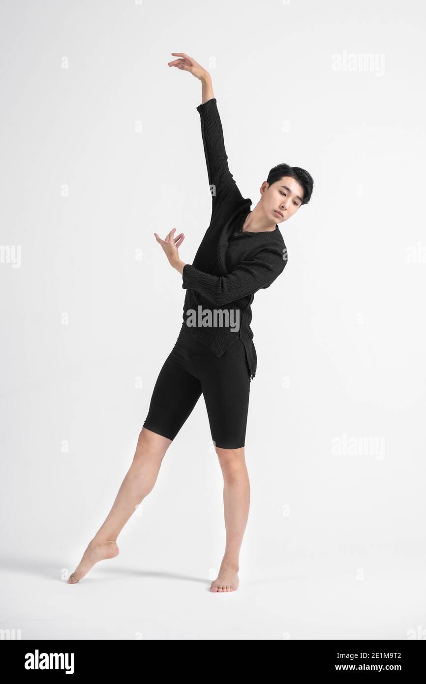contemporary asian male dancer making move in white background Stock ...