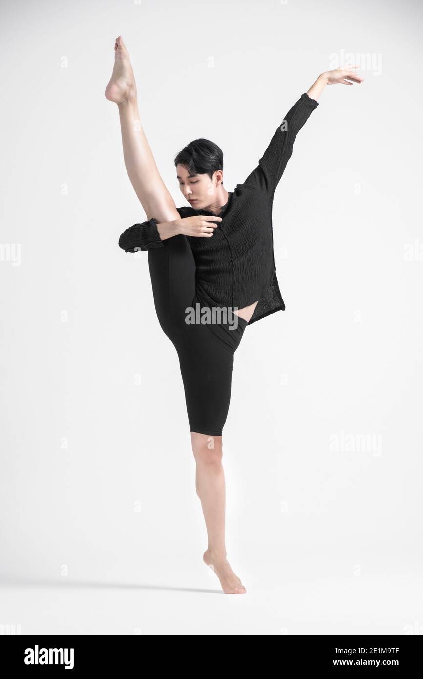 contemporary asian male dancer making move in white background Stock ...