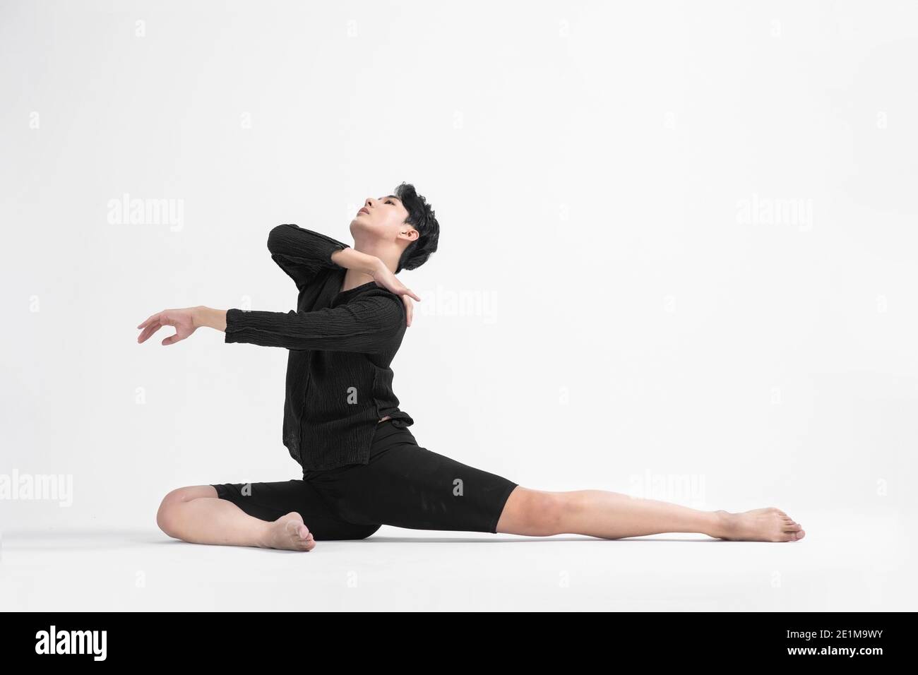 contemporary asian male dancer making move in white background Stock ...