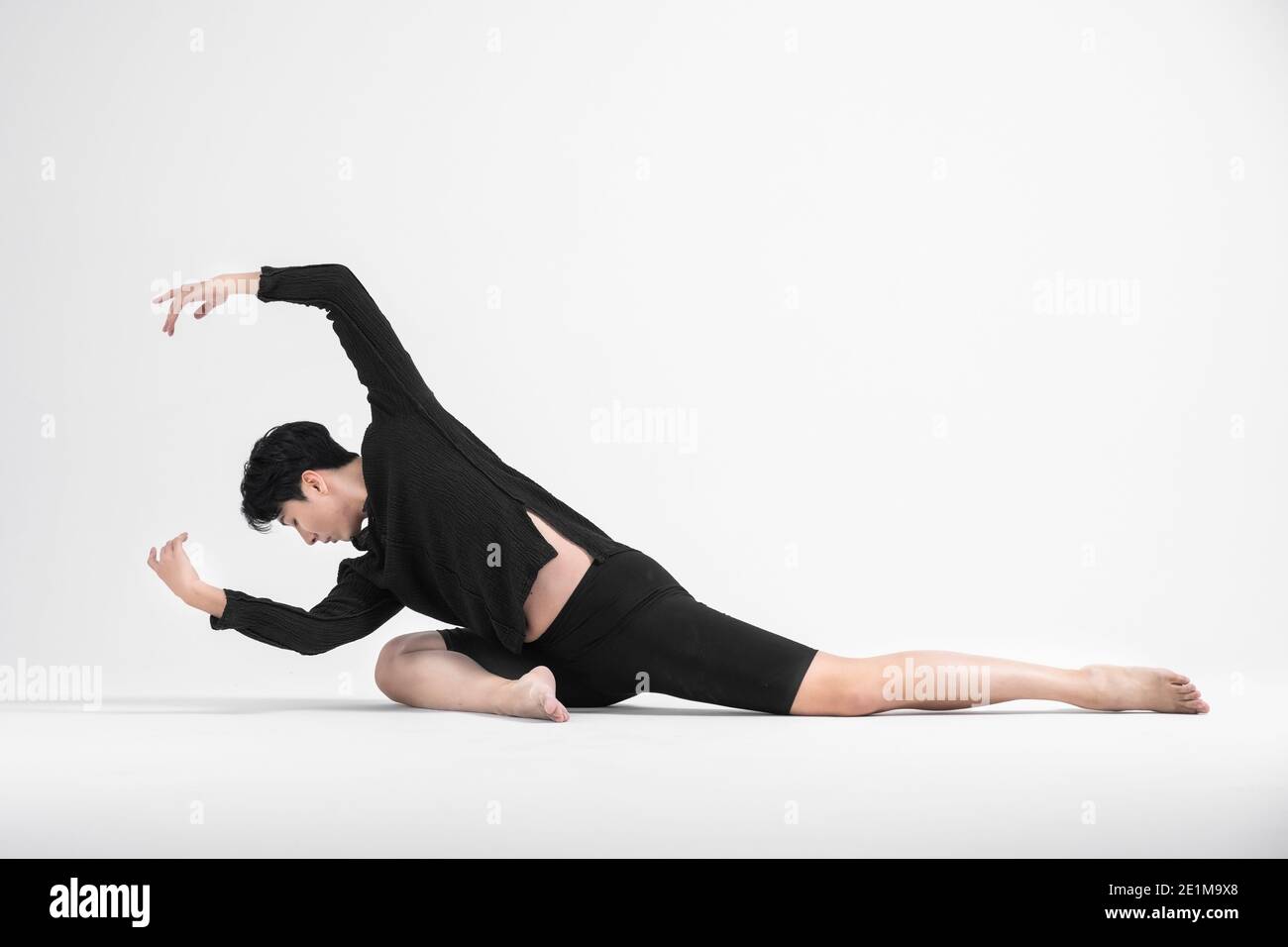 contemporary asian male dancer making move in white background Stock ...