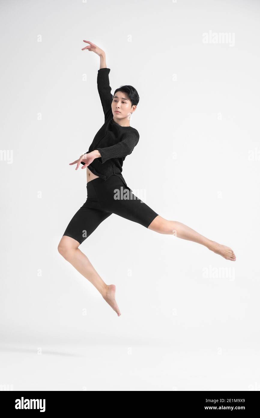 contemporary asian male dancer making move in white background Stock ...