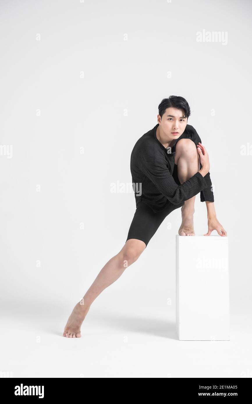 contemporary asian male dancer making move in white background Stock ...