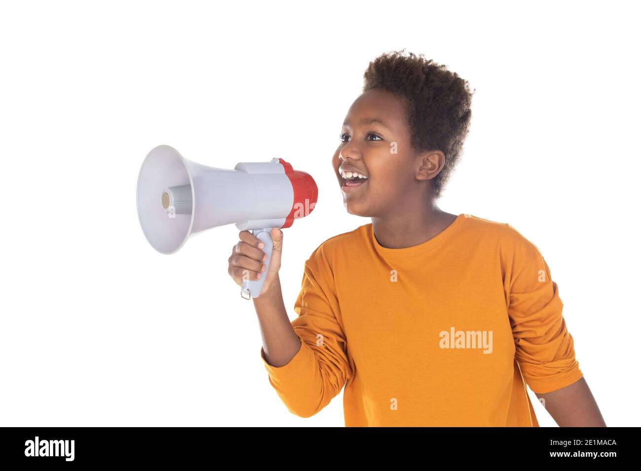 Happy little child speaking with a megaphone isolated on a white ...