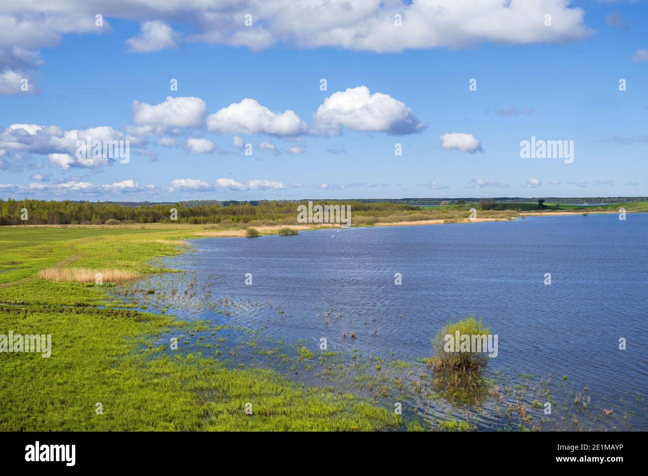 View at a beach with a meadow in a beautiful landscape Stock Photo - Alamy