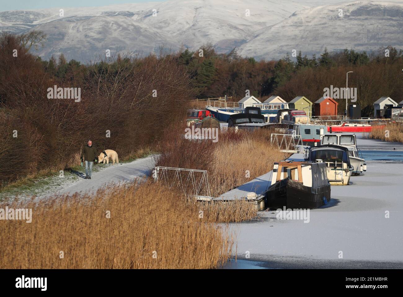 A frost and snow covered Forth and Clyde Canal near to the Kelpies in ...