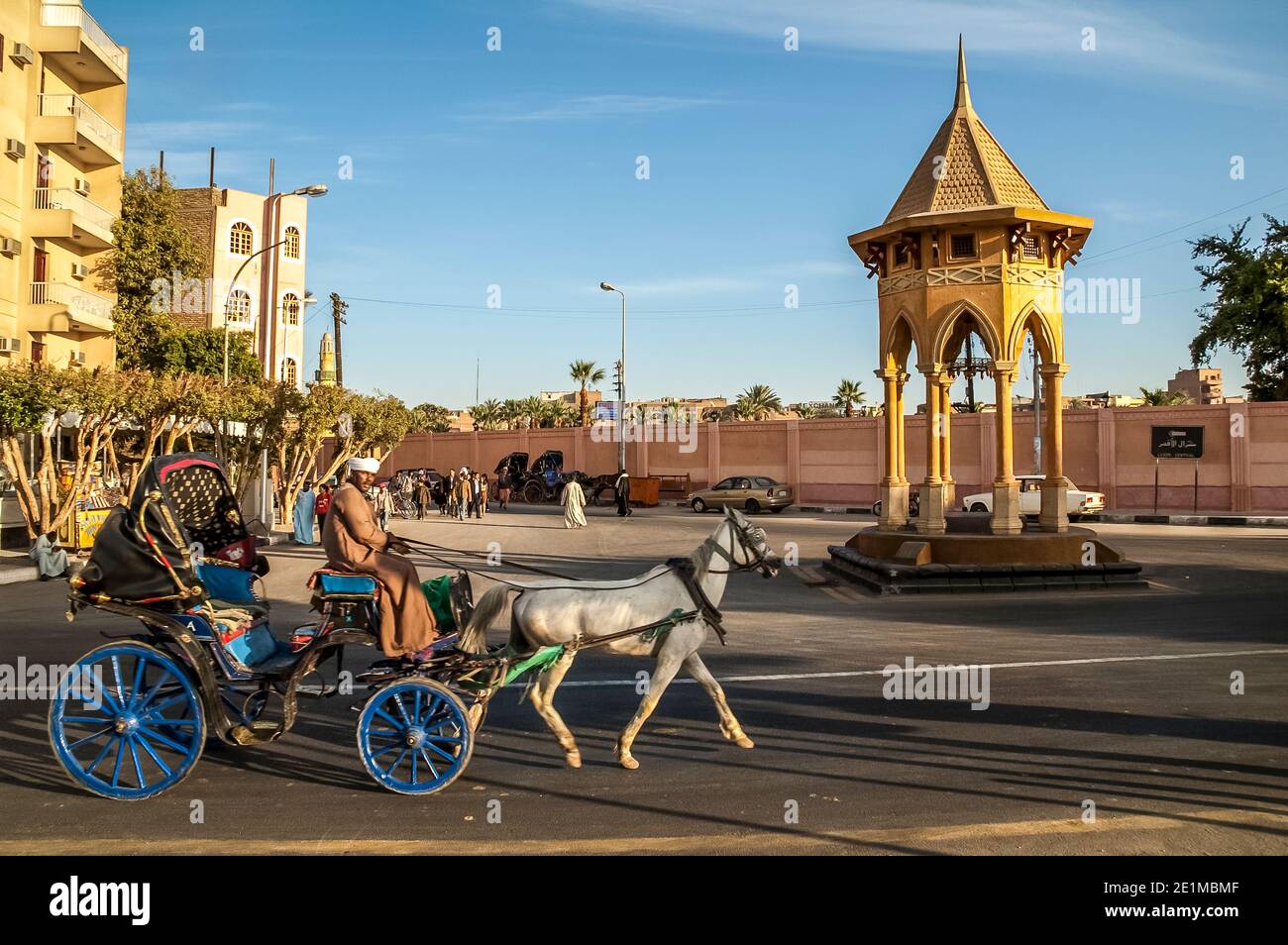 Luxor. Colourful street scenes with horse drawn carriages on the ...