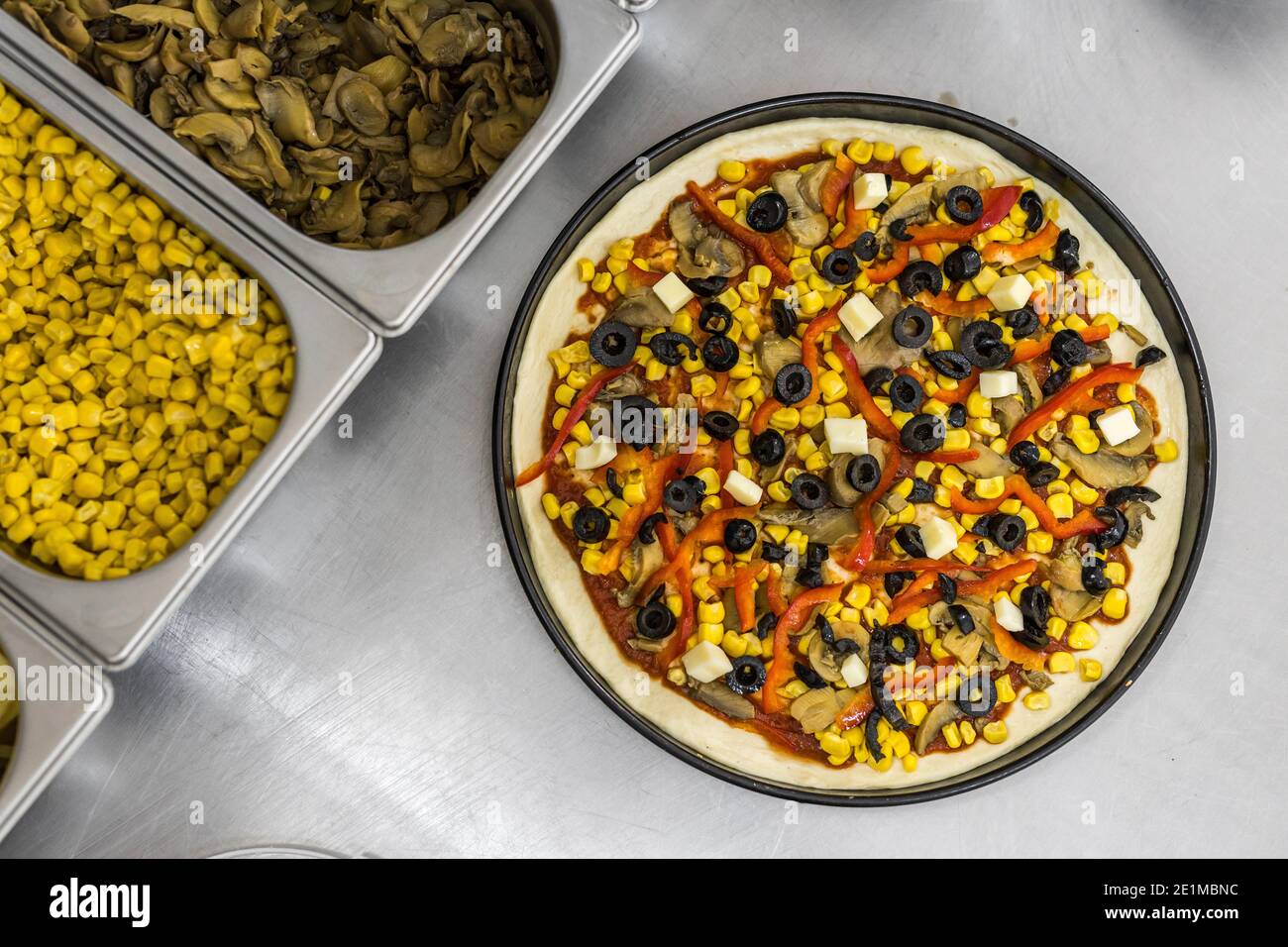 Making of a traditional italian pizza in the kitchen Stock Photo - Alamy