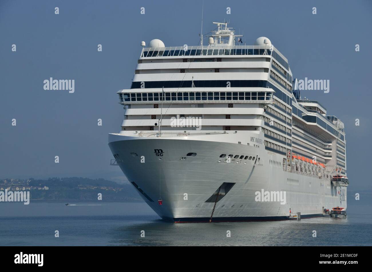 huge white cruise ship in a harbor on the sea side view Stock Photo - Alamy