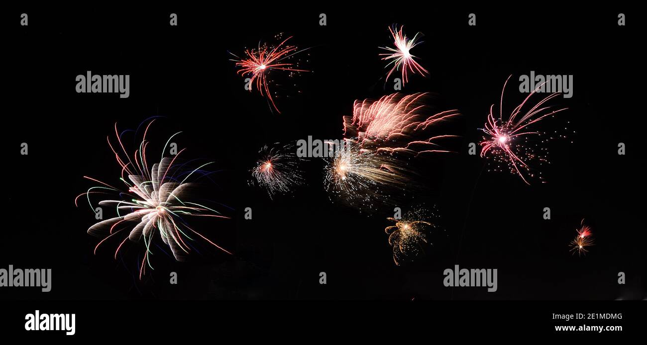 colorful fireworks with lots of explosions panorama Stock Photo - Alamy