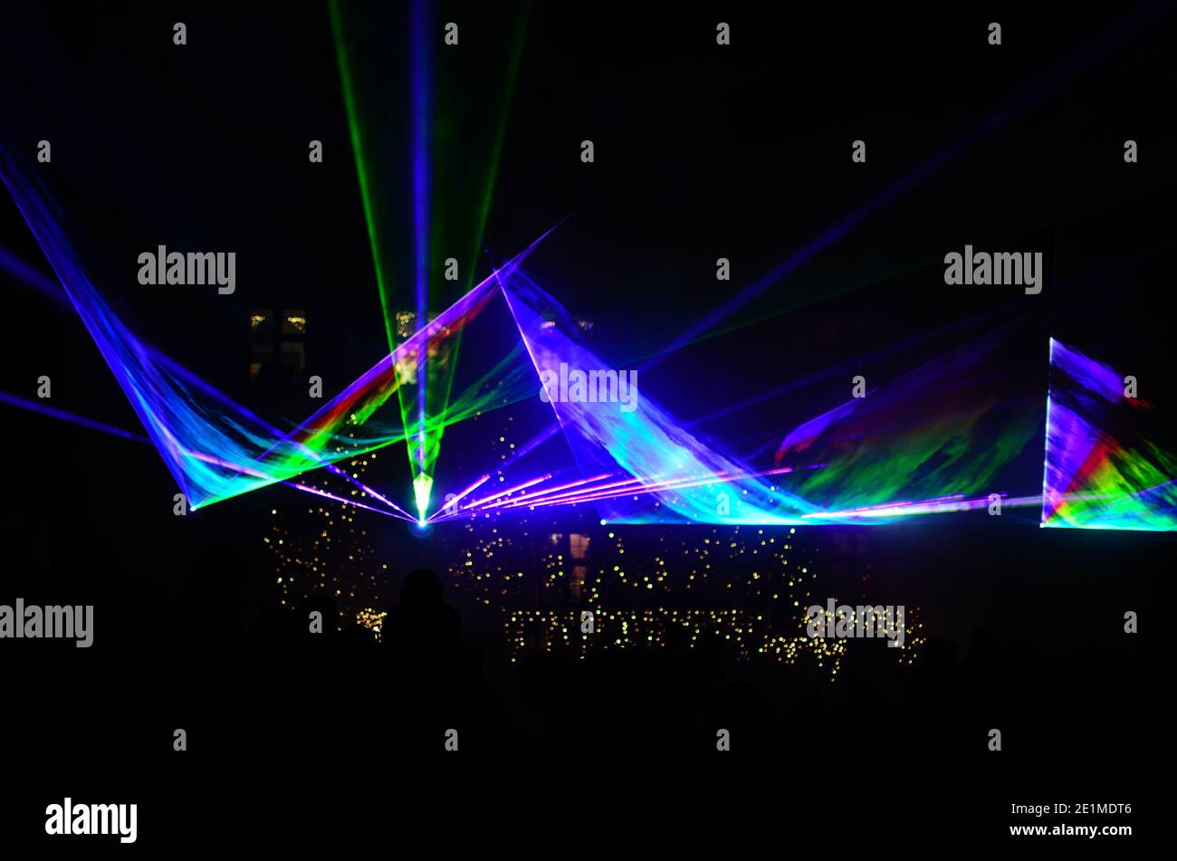 colorful rainbow colored laser show at night Stock Photo - Alamy