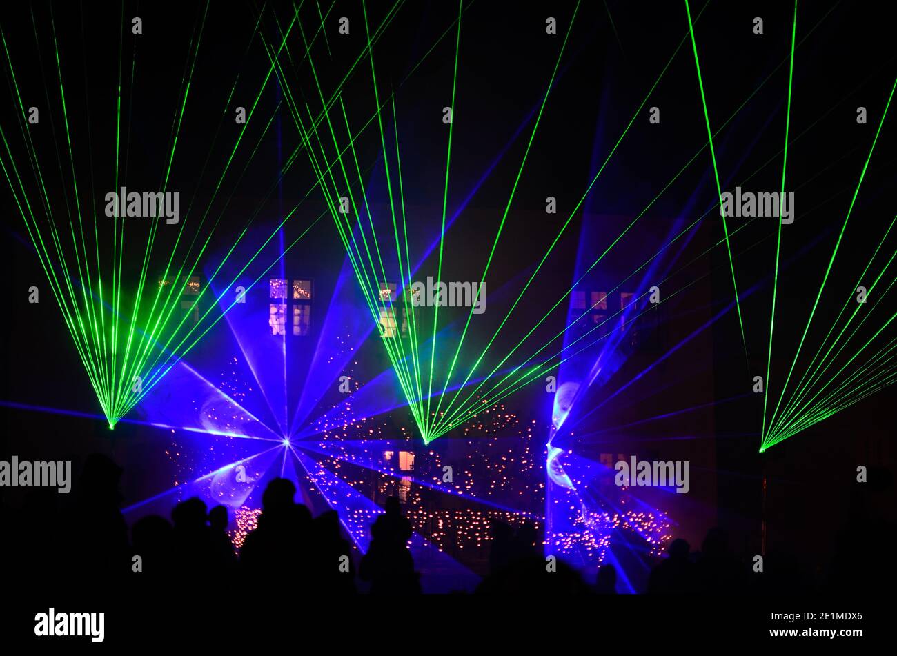 laser show with blue green glow in the night Stock Photo - Alamy