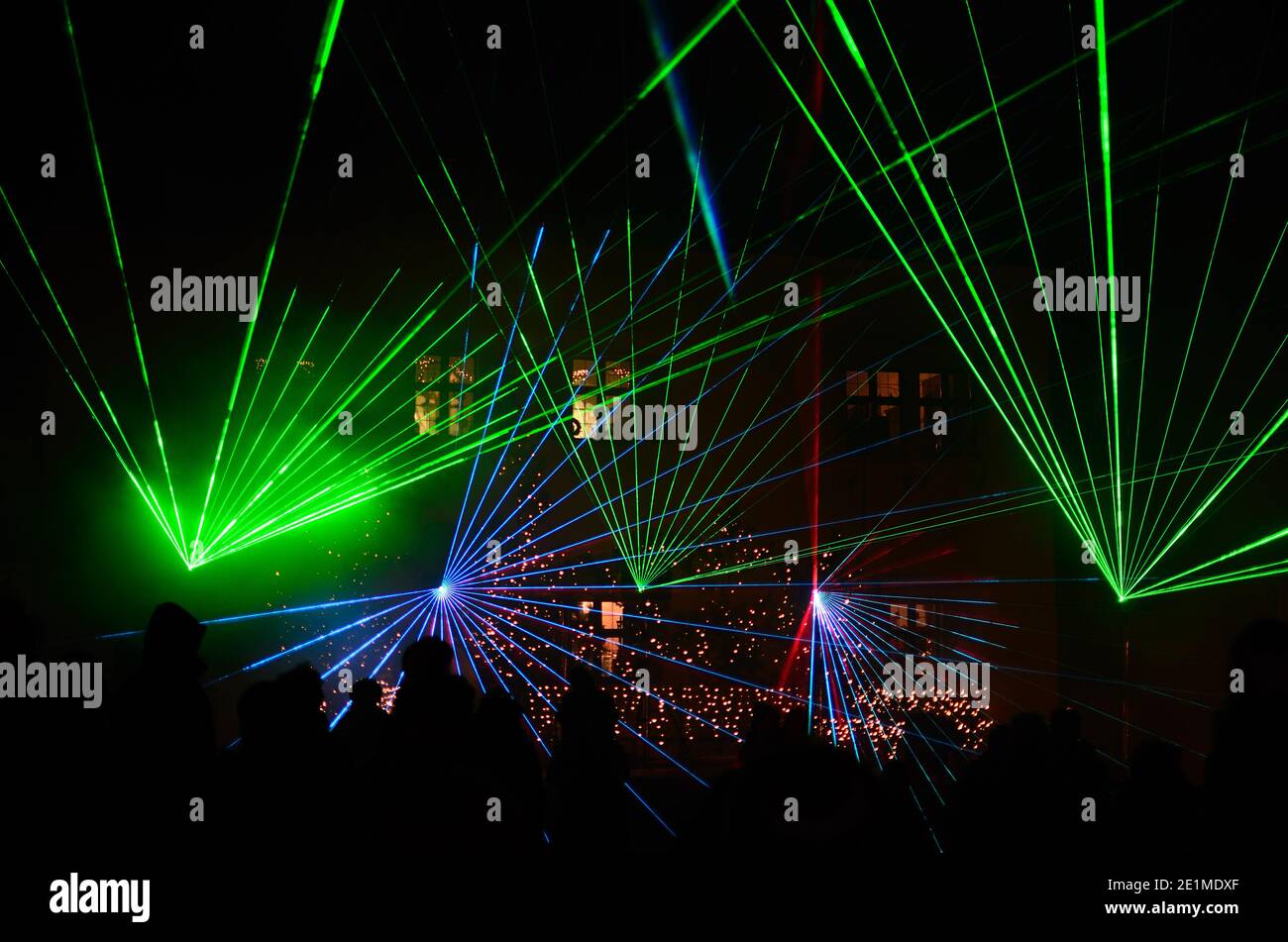 colorful laser show at night with audience on a place Stock Photo - Alamy