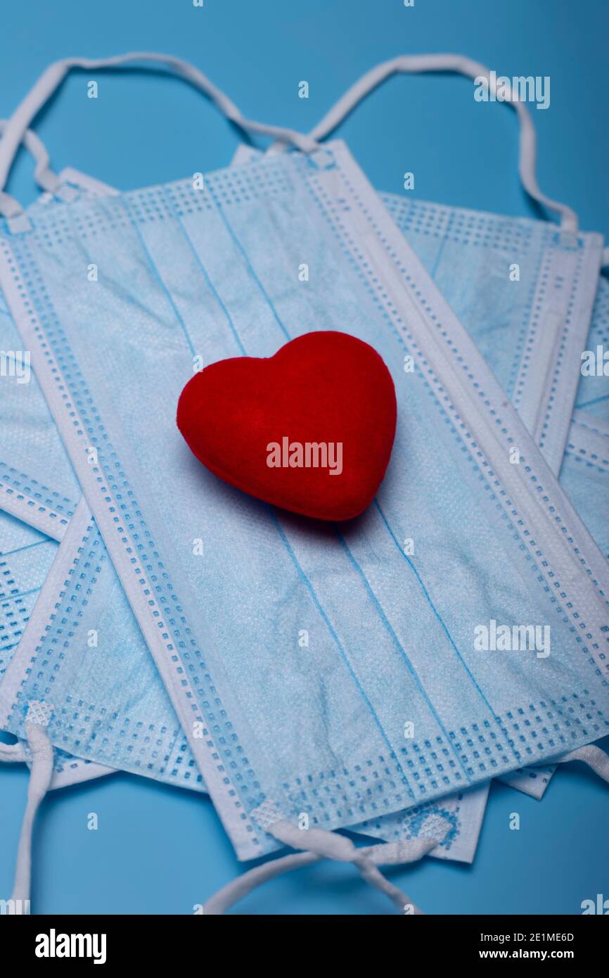 Isolated image of face masks with a red heart. Valentine concept Stock ...