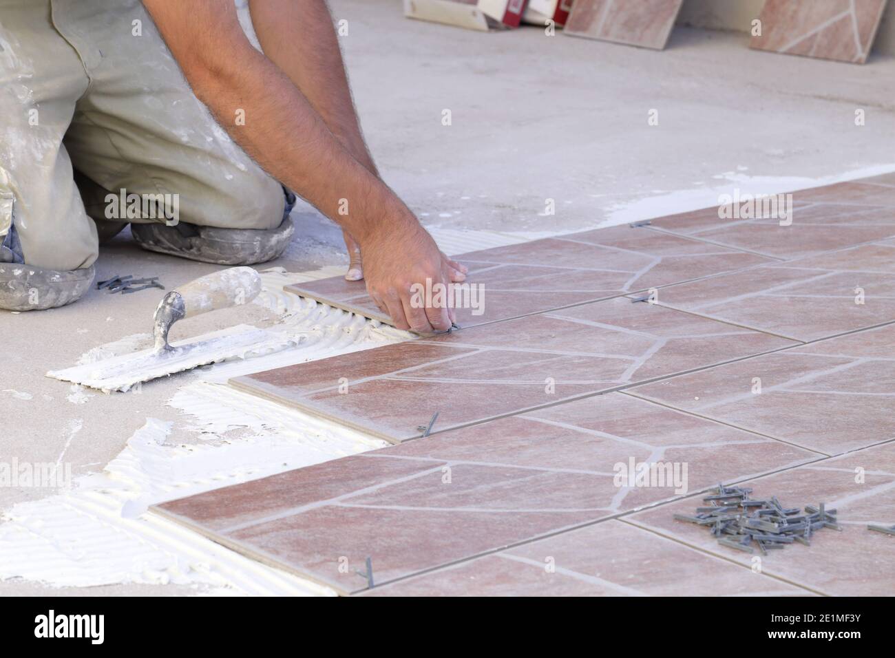 Tiler work bonding floor hi-res stock photography and images - Alamy
