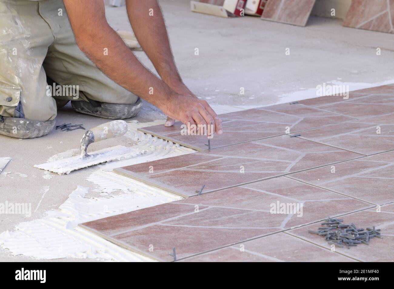 Tiler work bonding floor hi-res stock photography and images - Alamy