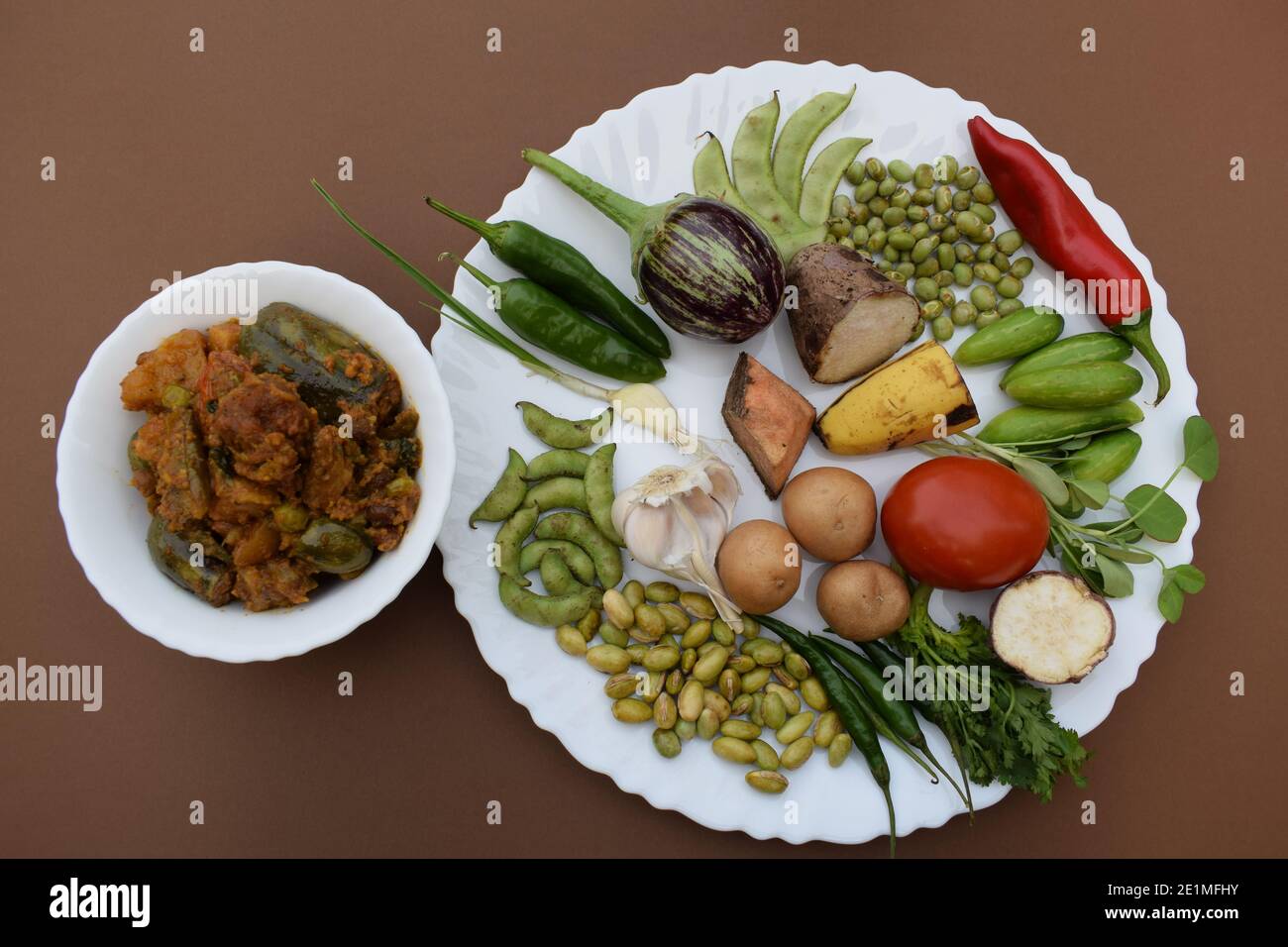 Top vide of all fresh vegetables used in preparation of making Undhiyu ...