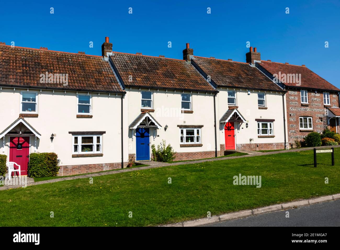 Row of houses with colourful doors hi-res stock photography and images ...