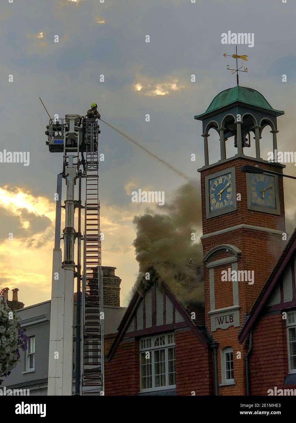 Fire Brigade attended burning building Stock Photo - Alamy