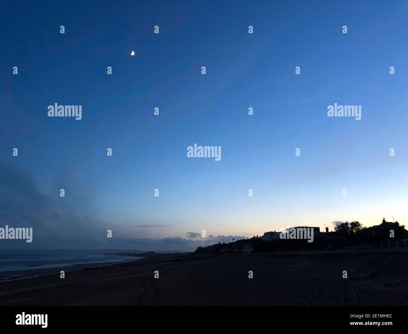 Cold beach evening blue sky night Stock Photo - Alamy
